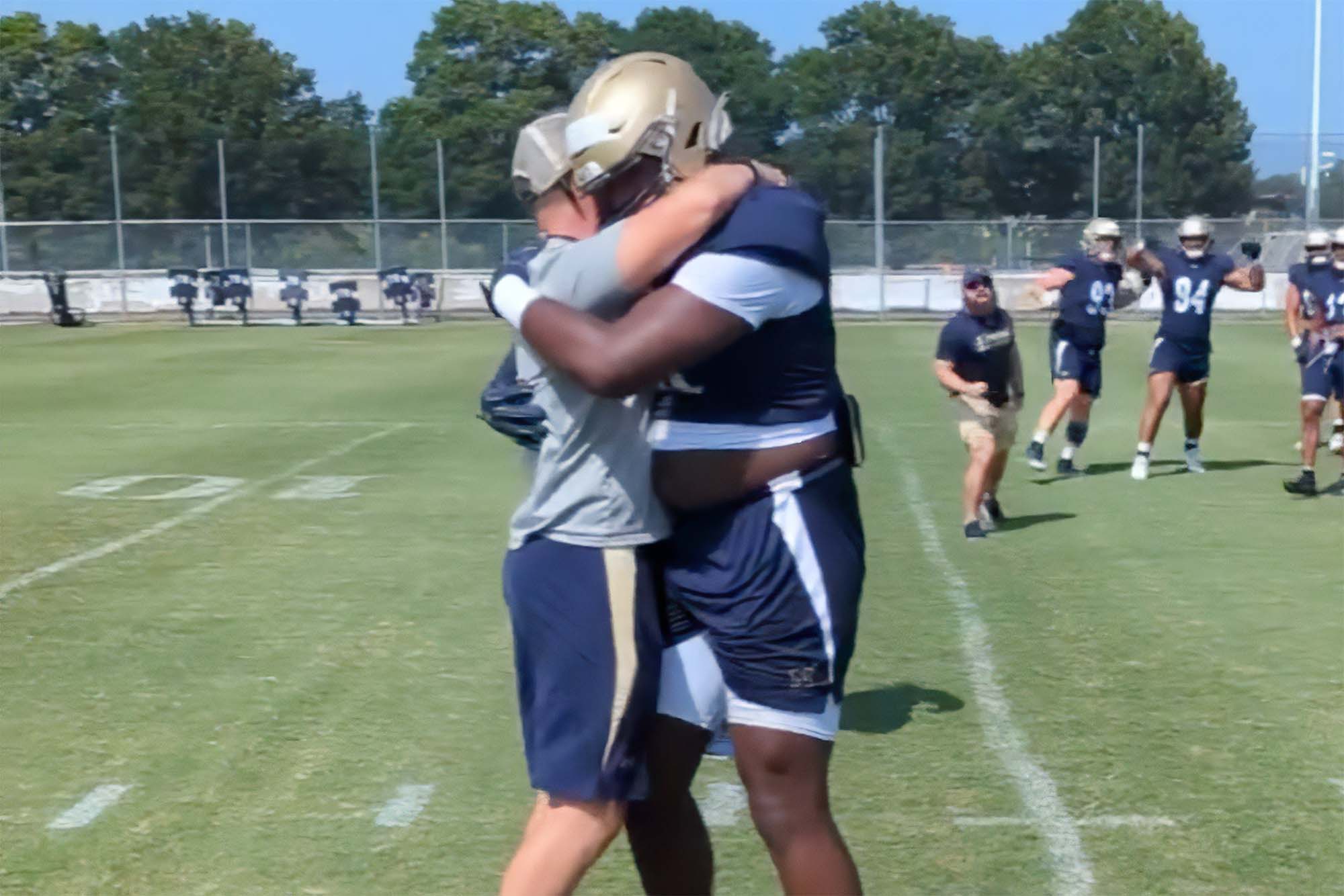 Emotional moment football player finds out his sister won gold at the ...